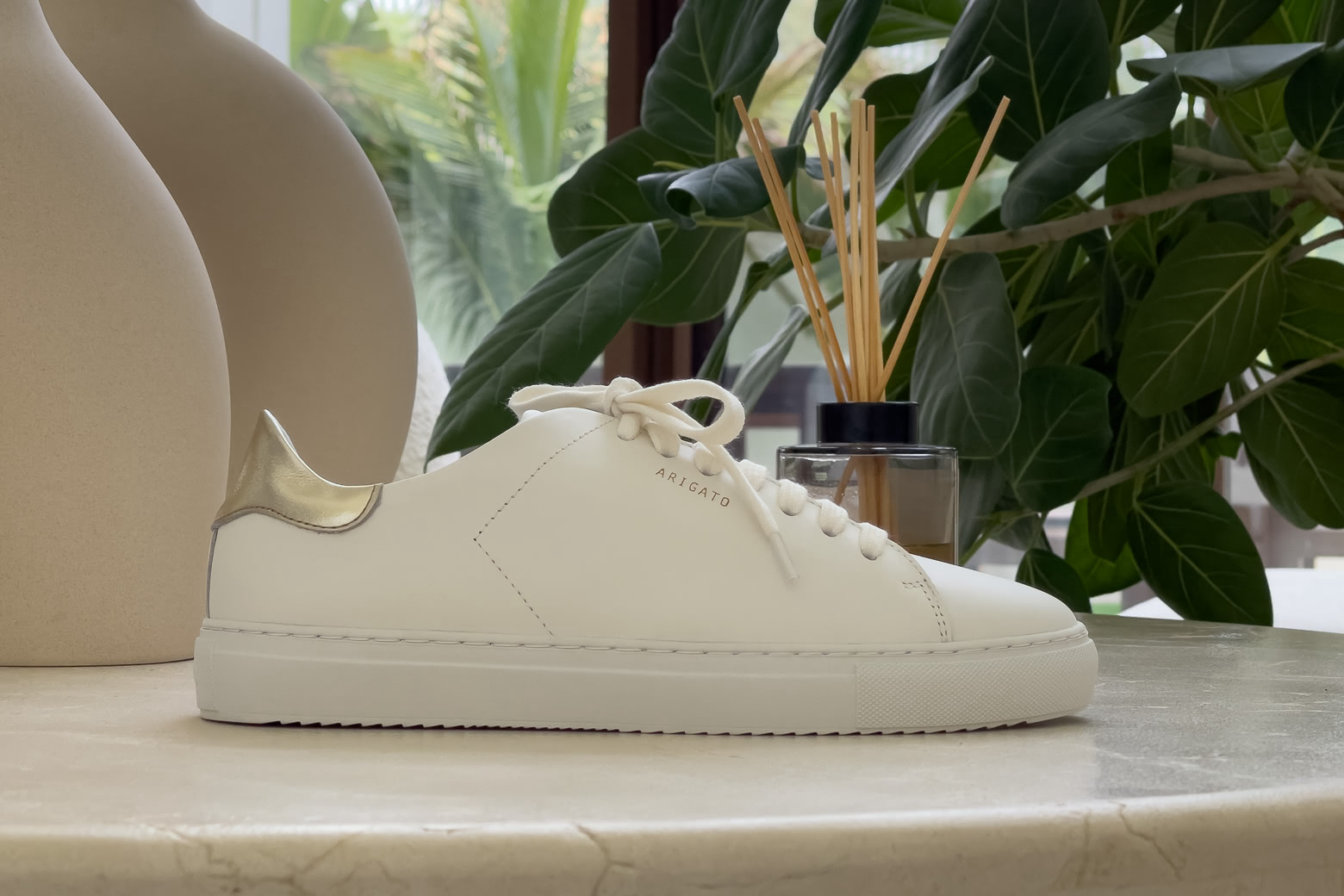 Axel Arigato Clean 90 Sneaker Review: A Chameleon Of A Sneaker